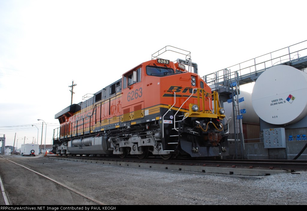 BNSF 6263 sits idle on the BNSF Lincoln Motor Works pad waiting for her next train.
